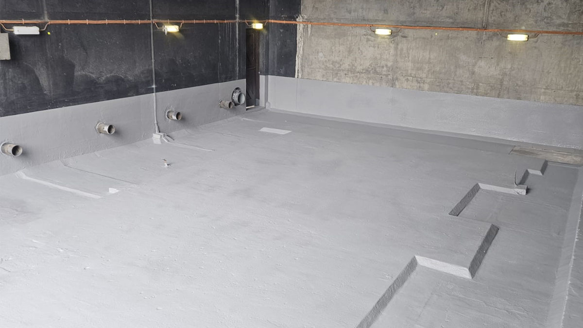 Applying Polyurea Coating to Line a Concrete Bund in Preparation for ...